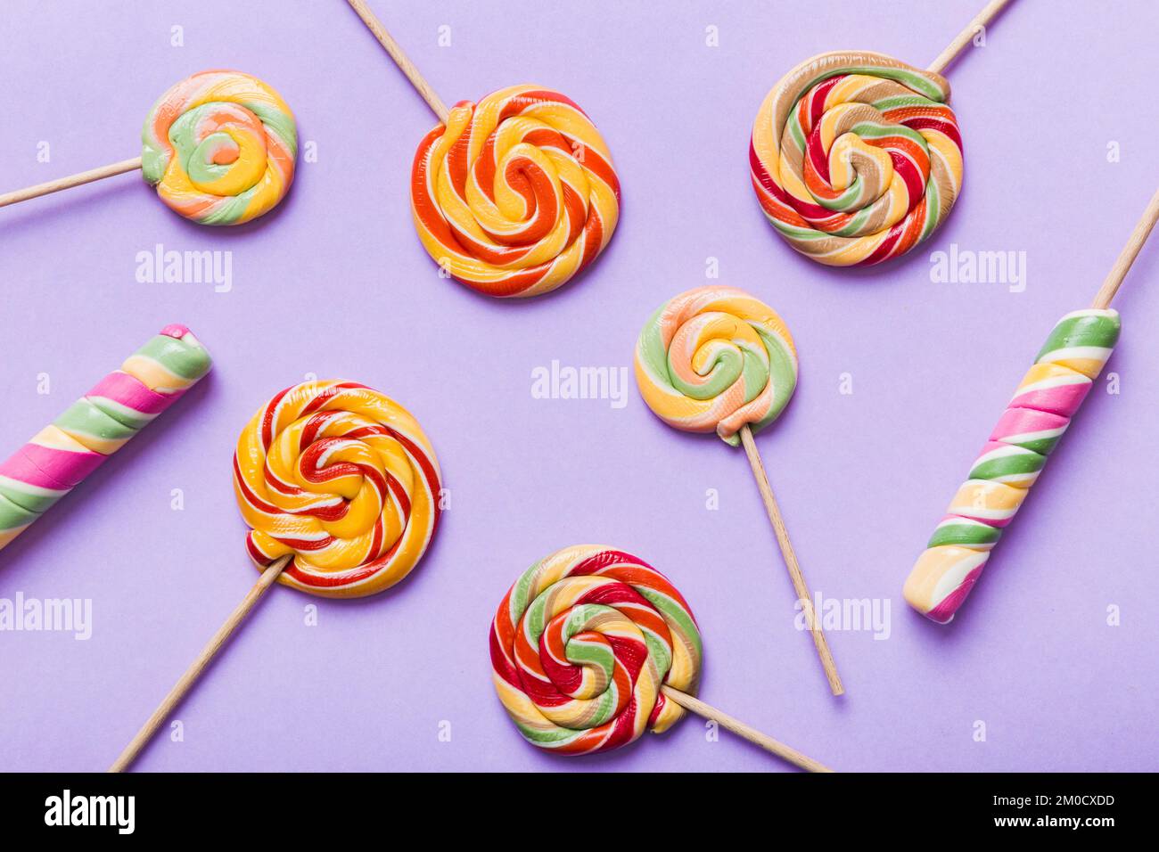 Set of colorful lollipops on colored background. Summer concept. Party ...