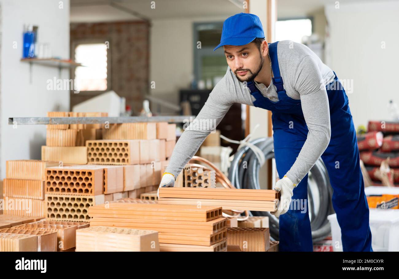 Interior building under reconstruction man hi-res stock photography and ...