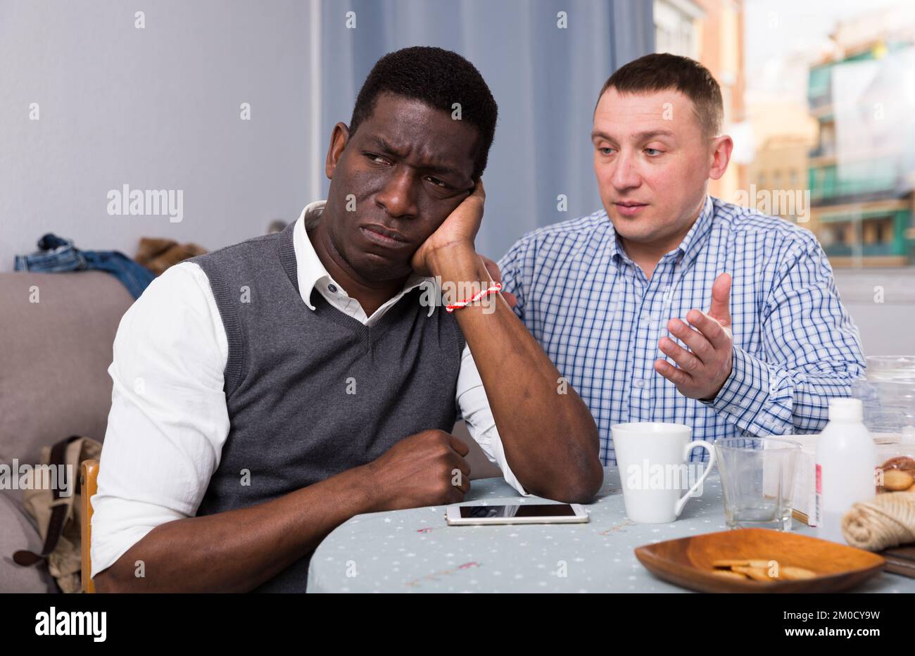 Two sad men person hi-res stock photography and images - Alamy