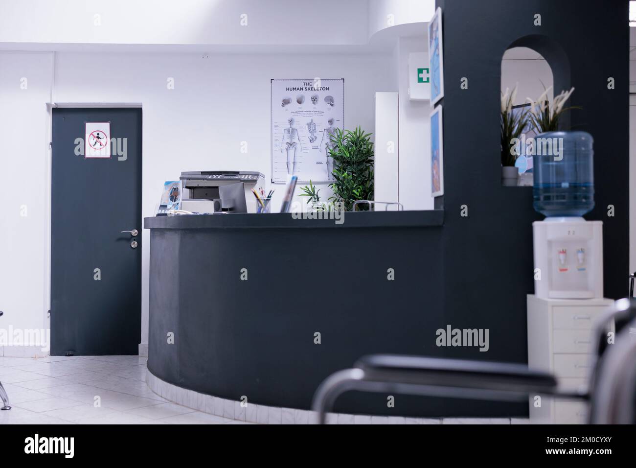 Corridor of waiting area of medical clinic with front desk for patient ...