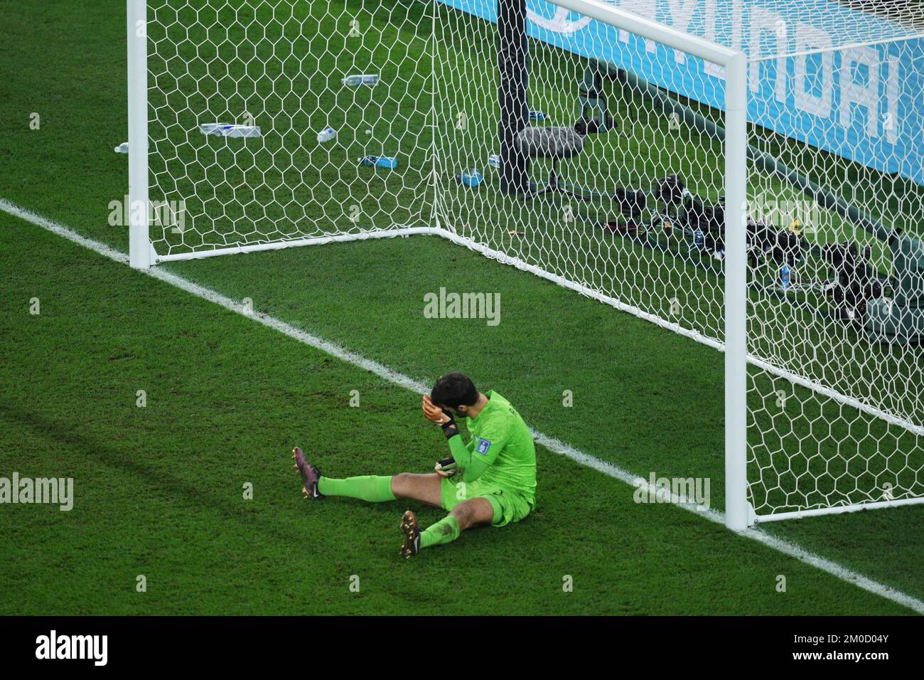 Doha, Qatar. 5th Dec, 2022. Brazil's goalkeeper Alison reacts after ...