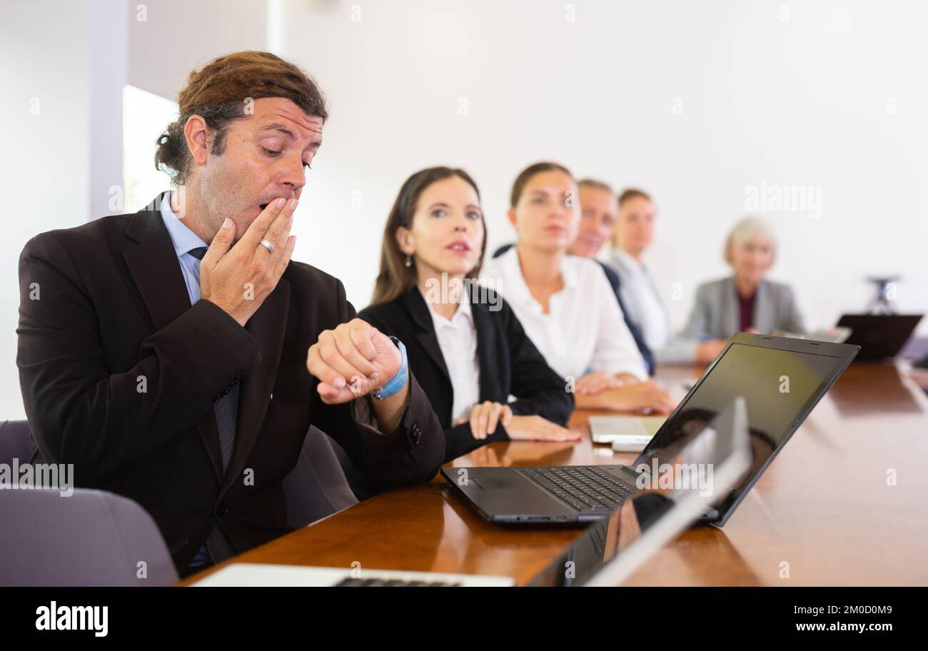 Exhausted businessman yawning work hi-res stock photography and images ...