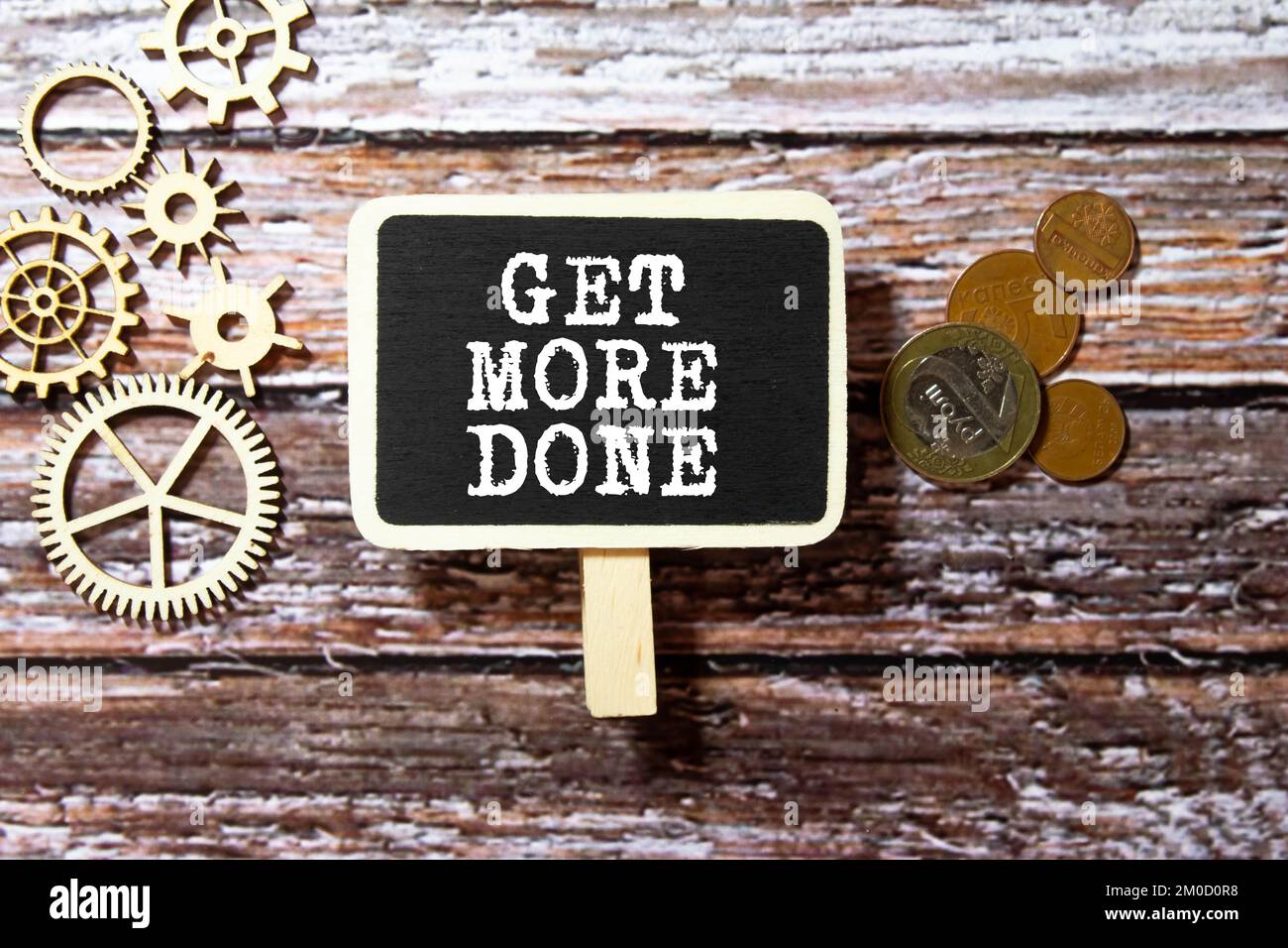 Get more done - Business handwriting with clock Stock Photo - Alamy