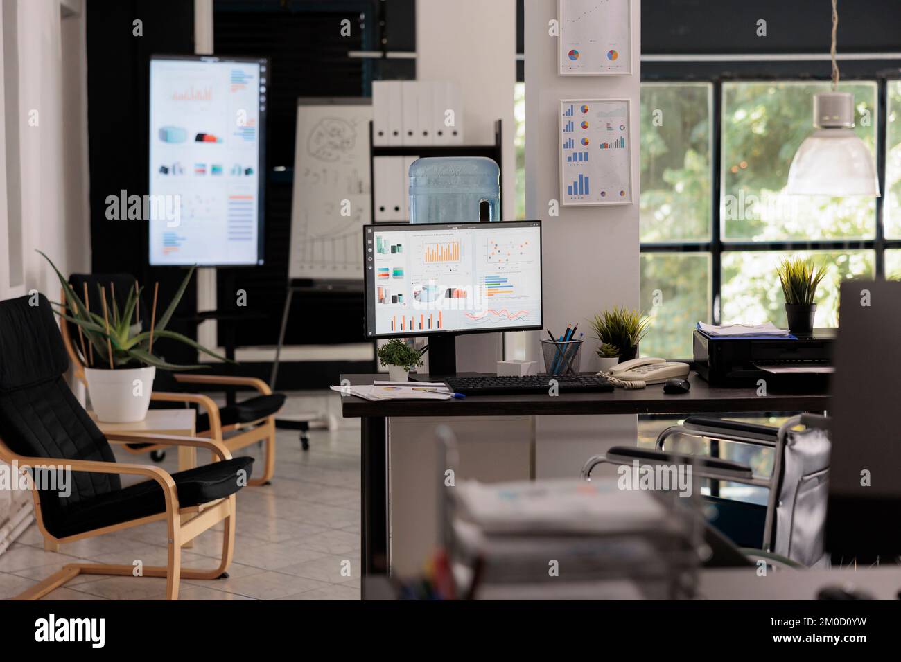 Financial analysis company workspace with desktop computers and large ...