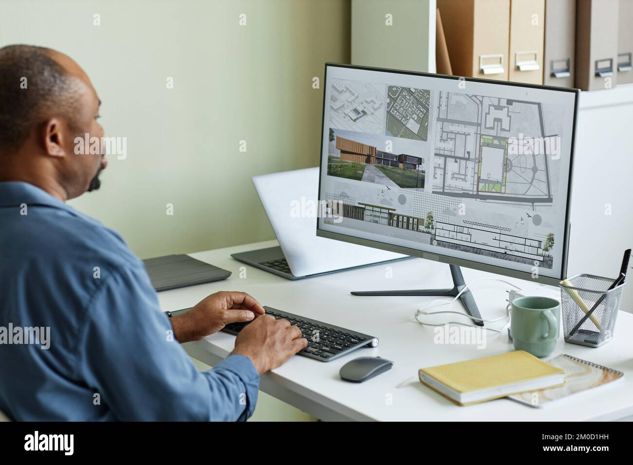 3d man sitting table working hi-res stock photography and images - Alamy