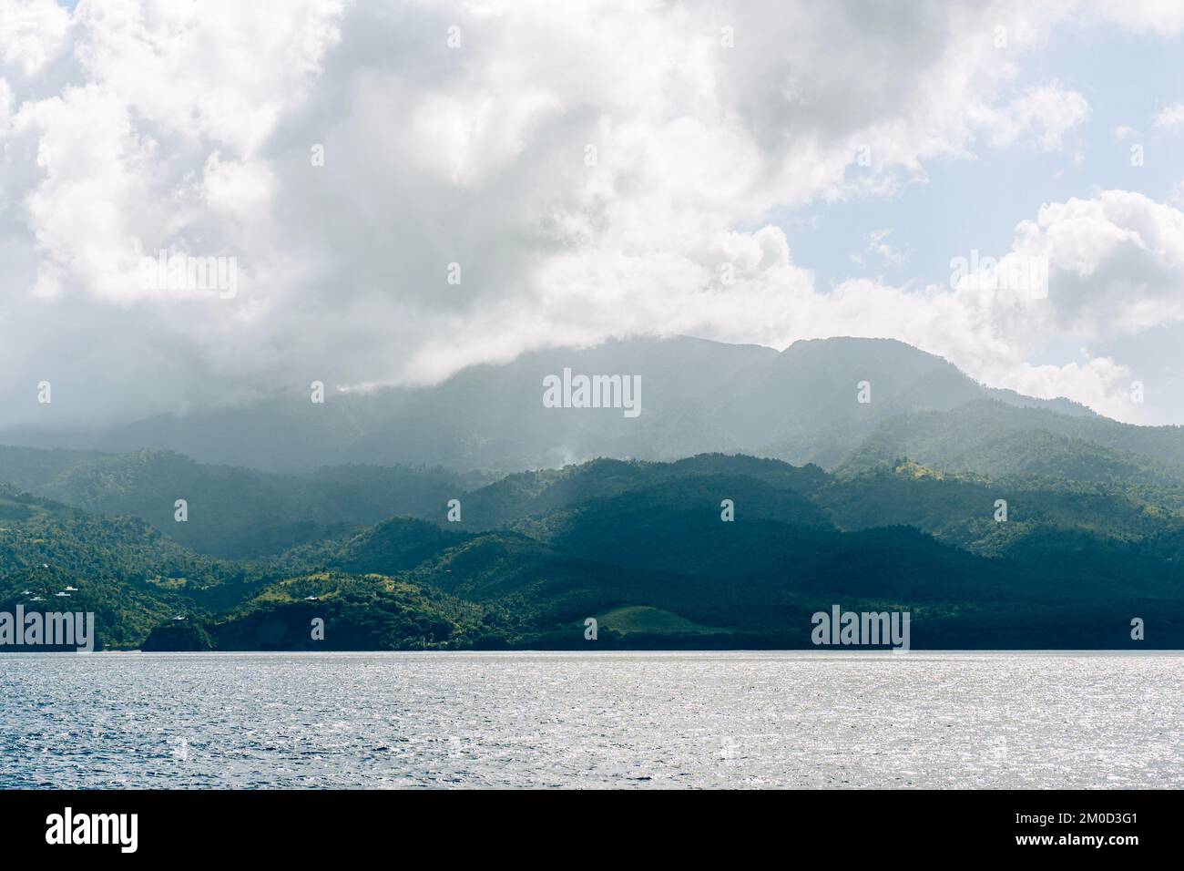 View of tree covered hills and mountains in Caribbeans. Rainforest land ...