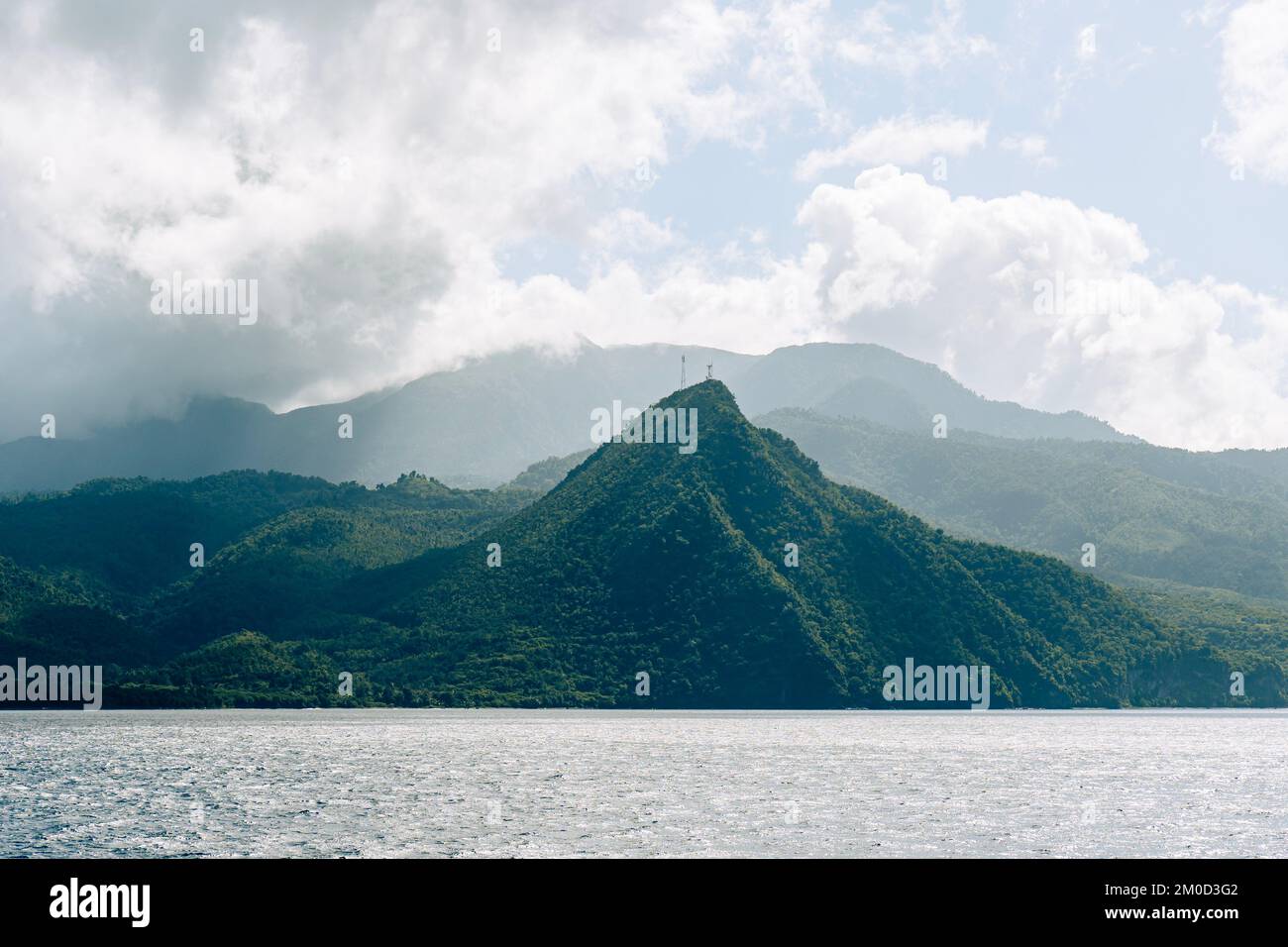 View of tree covered hills and mountains in Caribbeans. Rainforest land ...