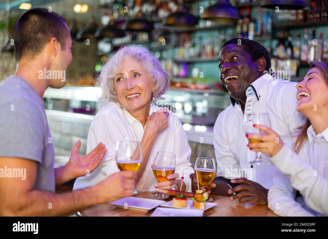 View on the happy diverse group laugh Stock Photo - Alamy