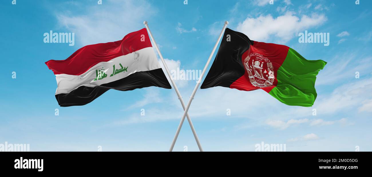 two crossed flags Afghanistan and Iraq waving in wind at cloudy sky. Concept of relationship ...