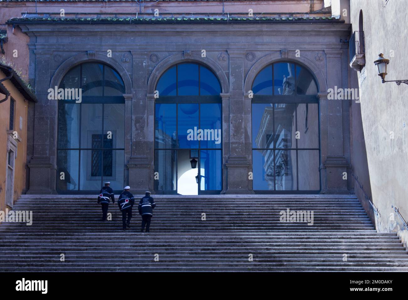 Three guards, three windows, and a whole bunch of steps Stock Photo - Alamy