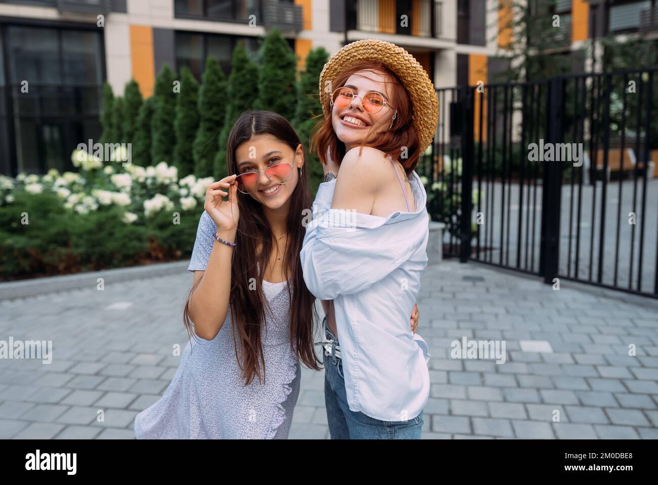 Two girlfriends having fun and fooling around Stock Photo - Alamy