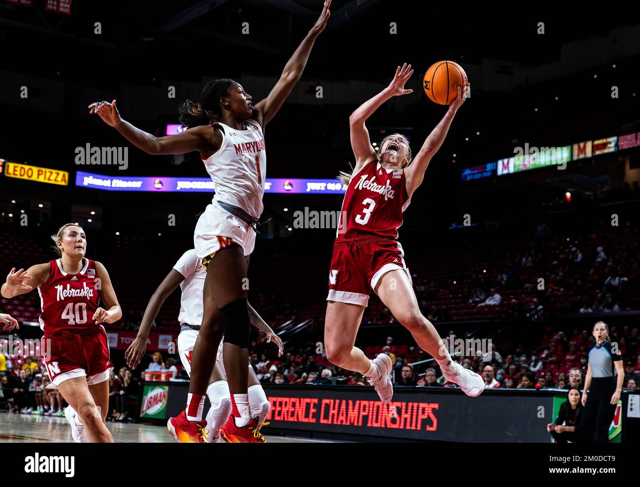 Action from a college basketball game Stock Photo - Alamy