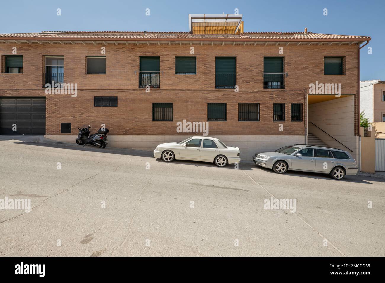 Facades of residential buildings in the street of a town on the ...