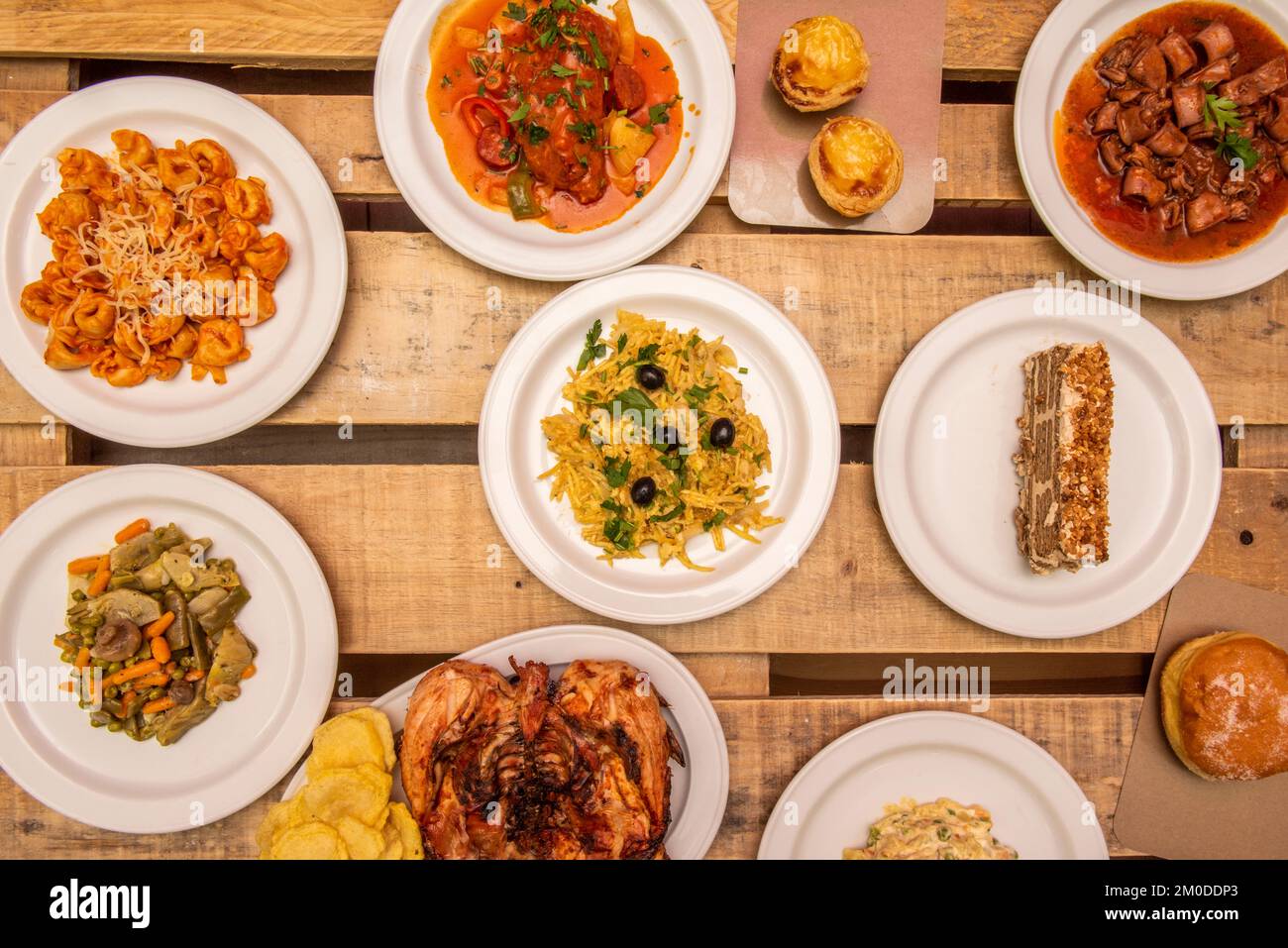 Typical Spanish tapas dishes with salad, vegetable stew, cod stew ...