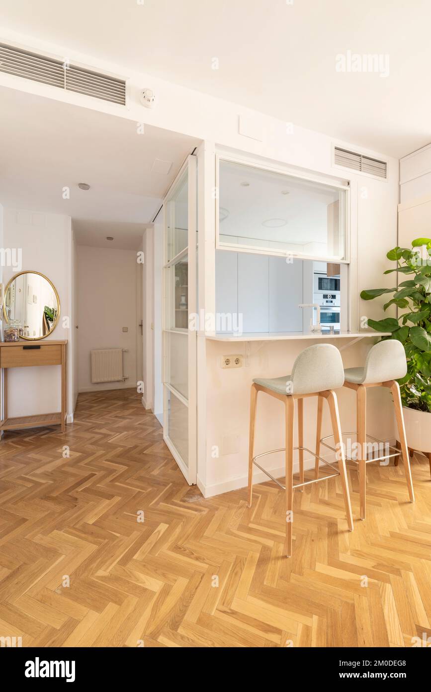 Living room and promenade area of a house with varnished French oak ...
