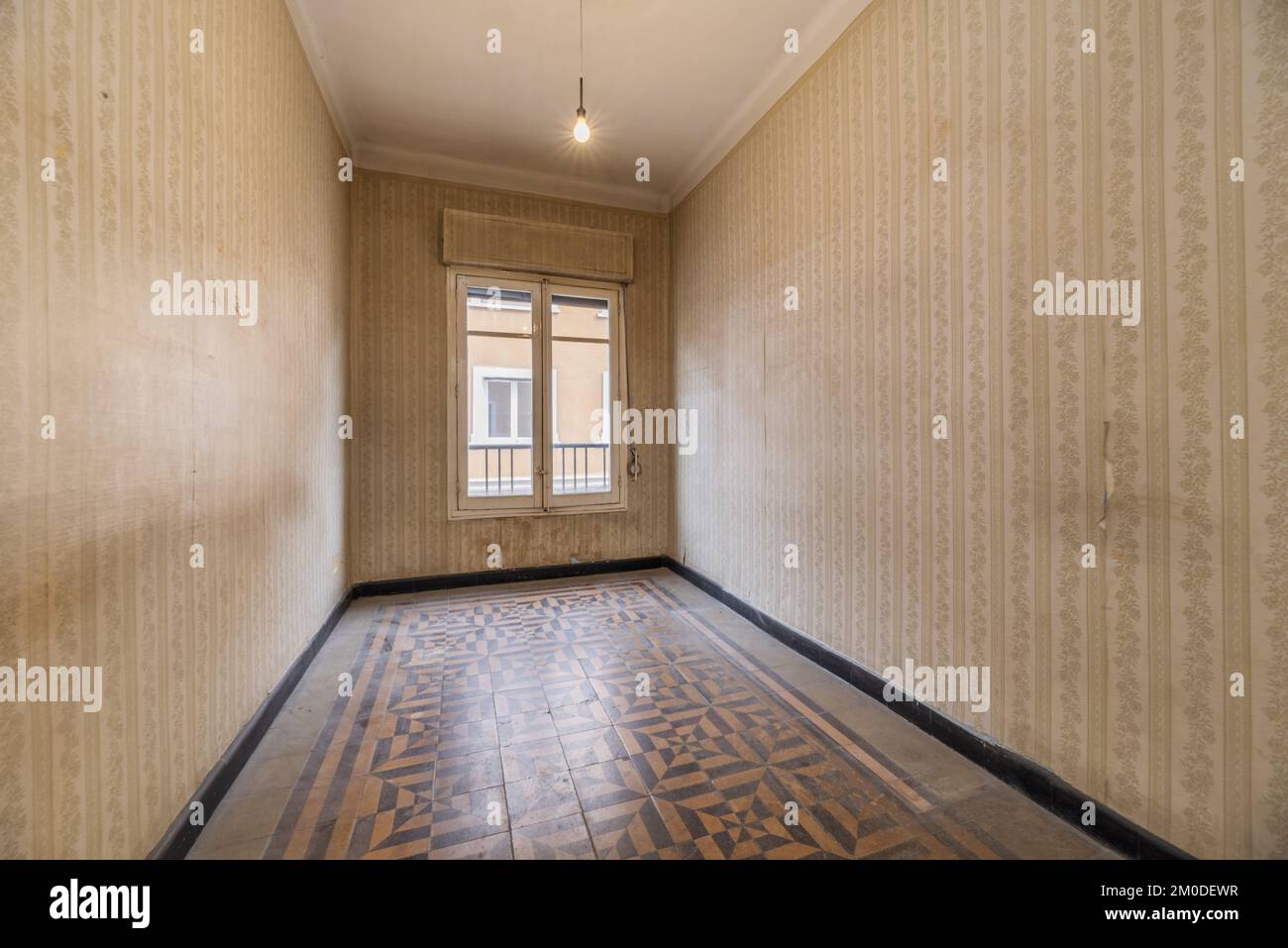 Empty room in an old house that looks like a time capsule with ...
