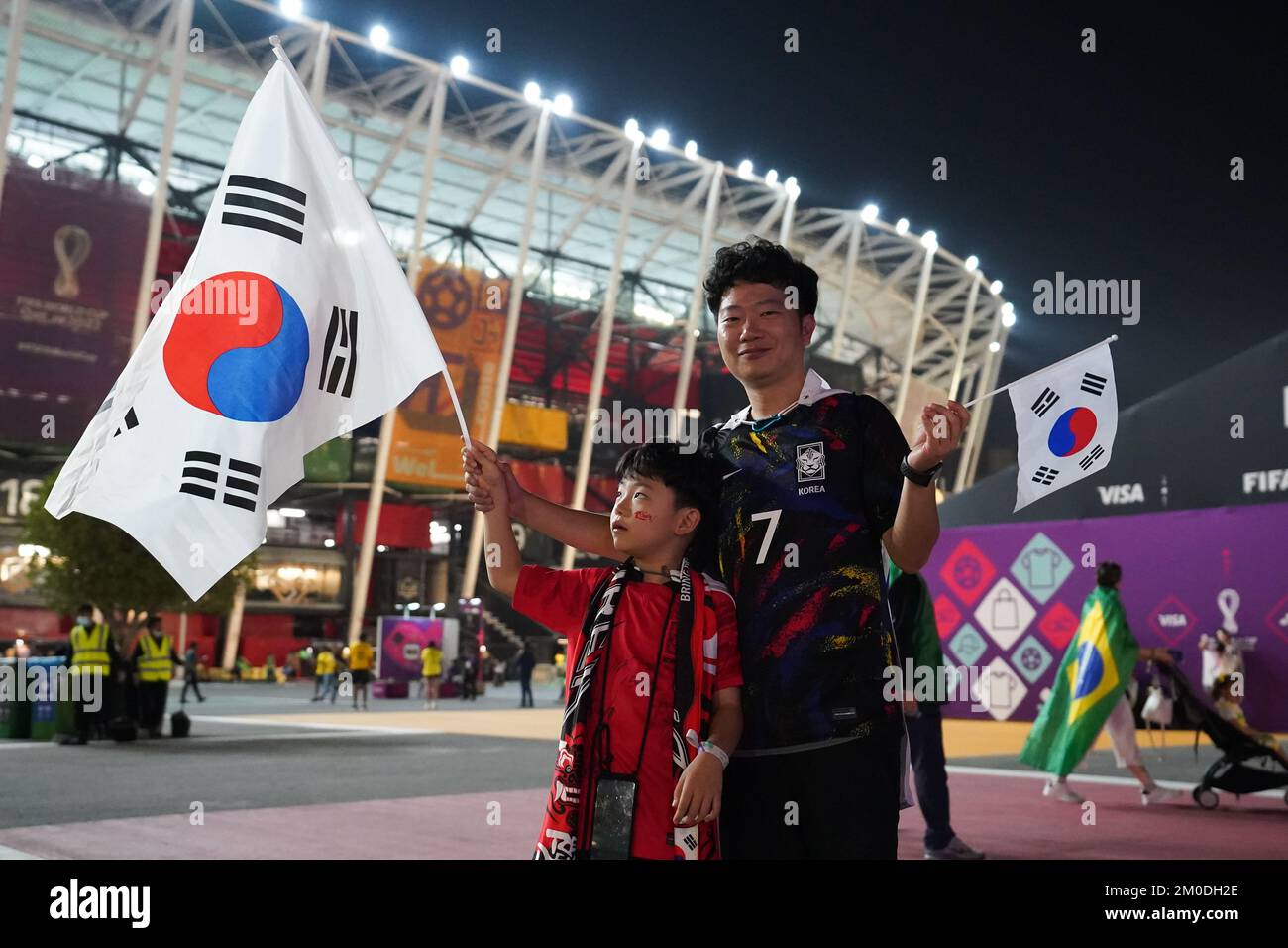 DOHA, QATAR - DECEMBER 5: Supporters of South Korea pose for a photo ...