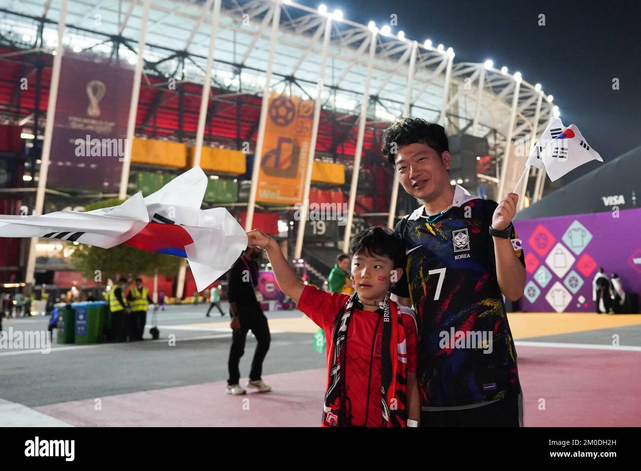 DOHA, QATAR - DECEMBER 5: Supporters of South Korea pose for a photo ...