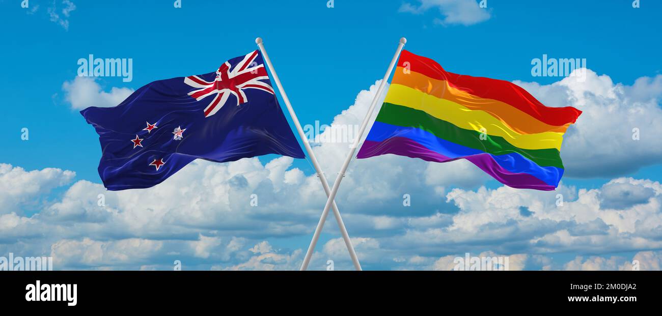 two crossed flags LGBT Pride and New Zeeland waving in wind at cloudy ...