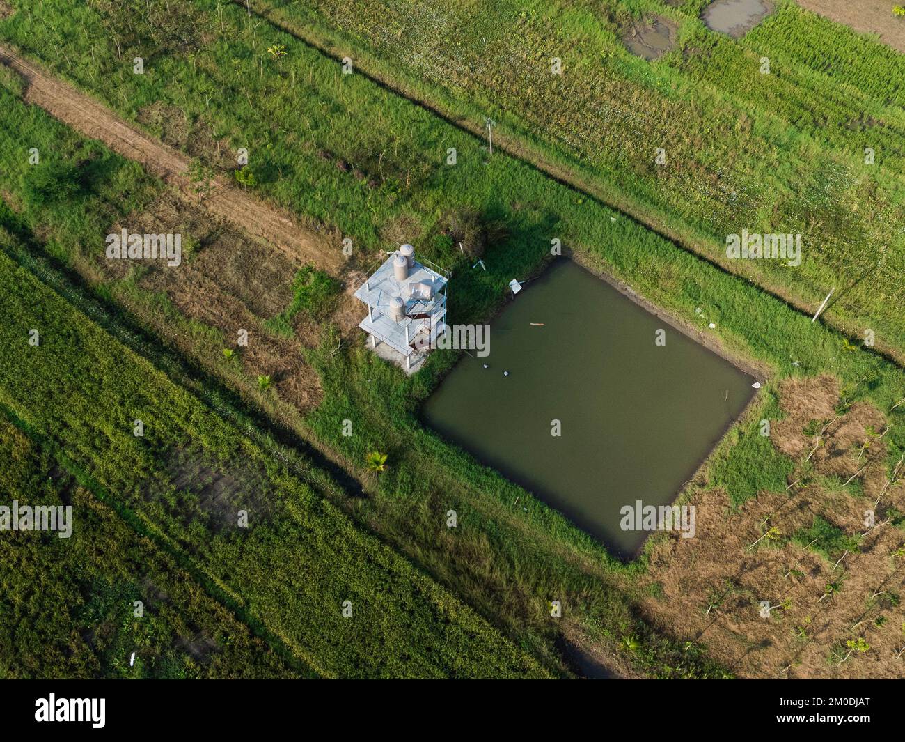 Aerial view of ponds for agriculture in rural areas. Pond for aggregate ...