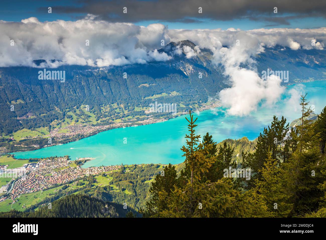 Aerial view of Swiss Alps and Lake Brienz at dramatic sunset ...