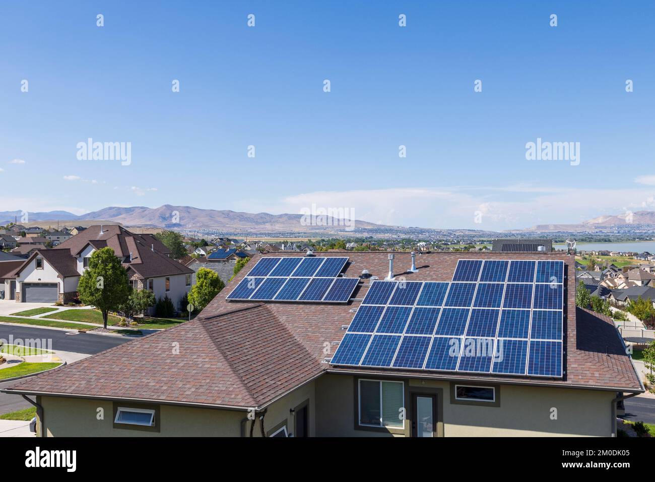Solar panels on a suburban roof hi-res stock photography and images - Alamy