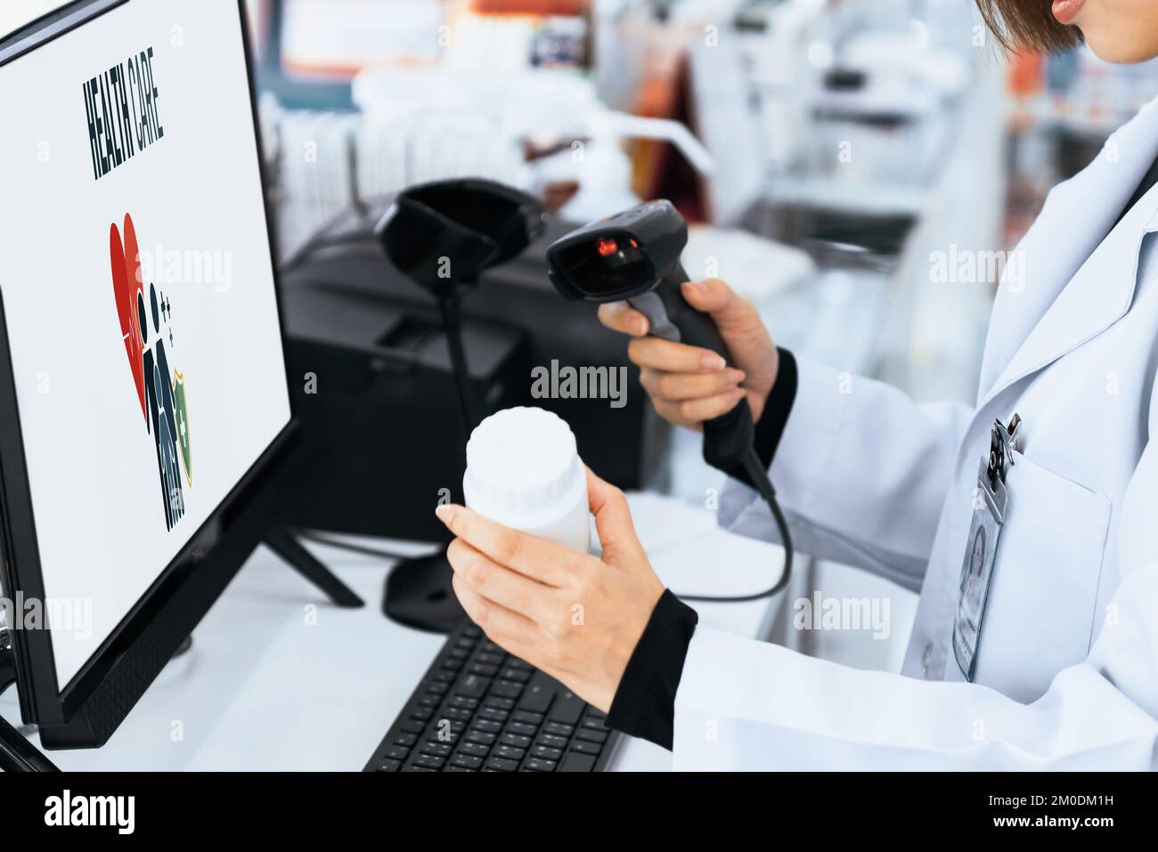 Woman scanning barcode pharmacy hi-res stock photography and images - Alamy