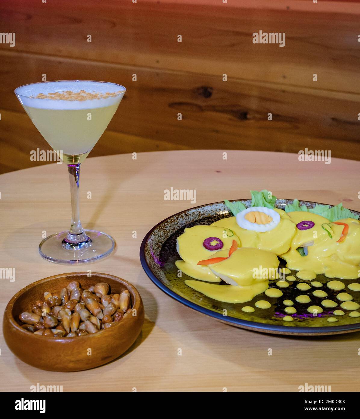 Papa a la huancaina, served with olives, hard-boiled egg and lettuce ...