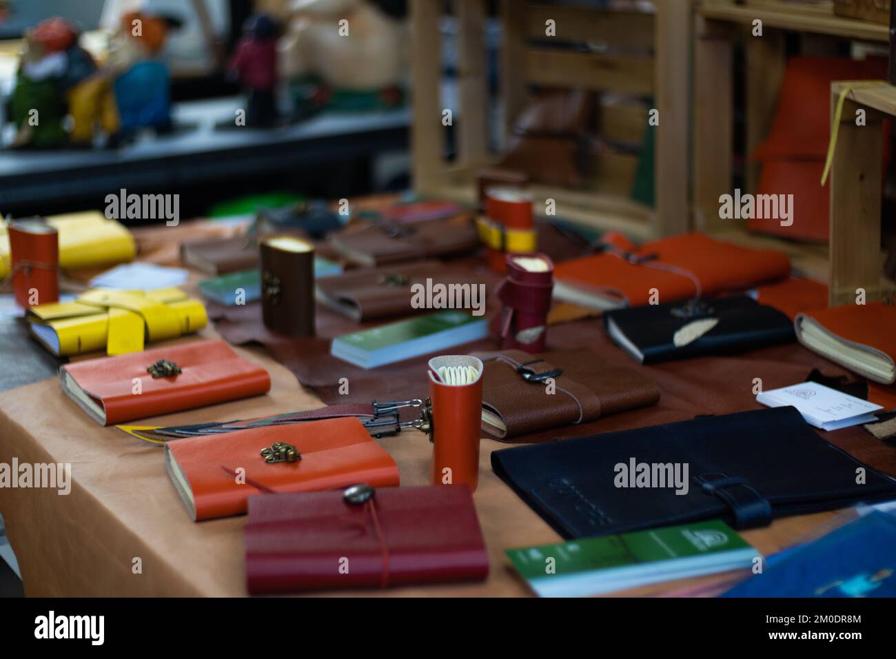 Multi-colored notebooks made of leather Stock Photo - Alamy