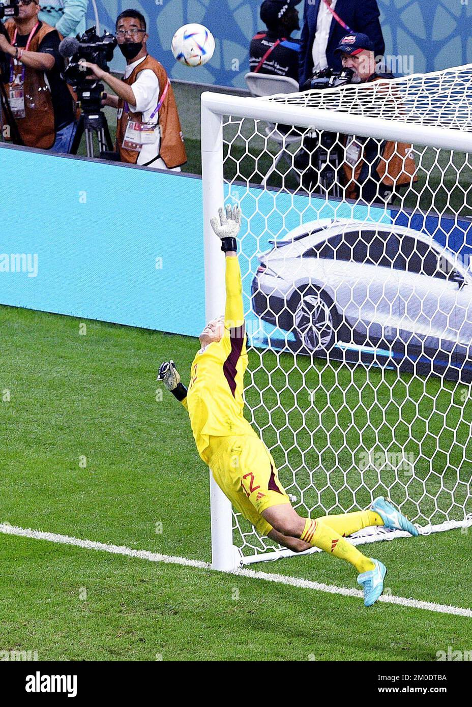 Japan goalkeeper Shuichi Gonda saves from Luka Modric during the second ...