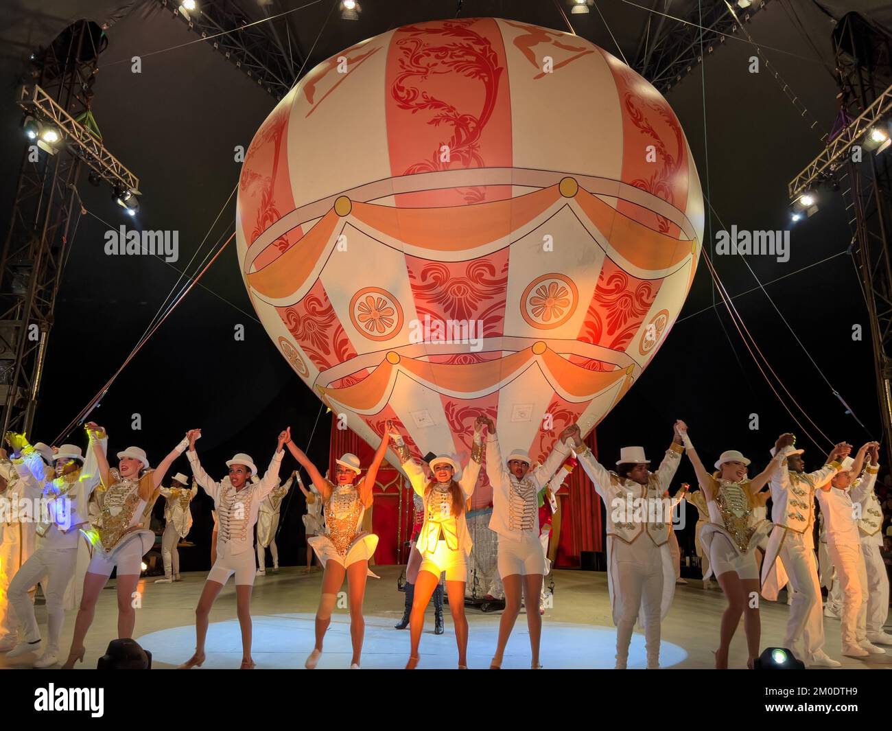 Artists gather around the stage front to perform for the audience Stock ...
