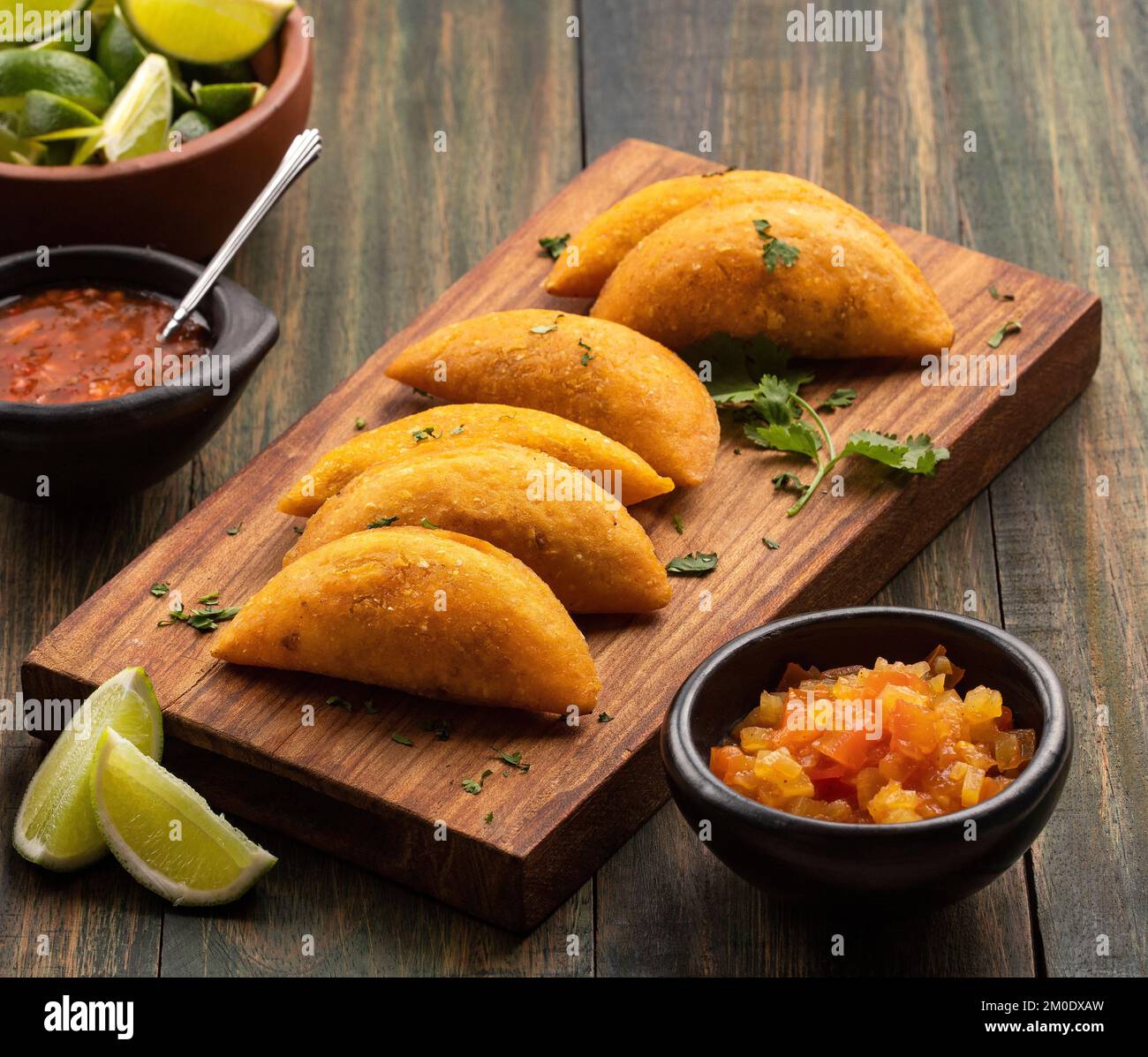 Colombian empanada with spicy sauce - Traditional food from Colombia ...