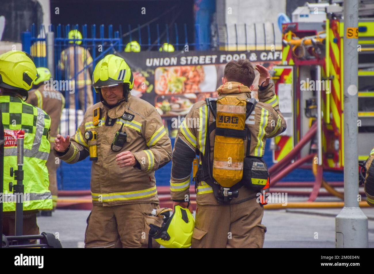 London Fire Brigade firefighters on the scene of a blaze which broke ...
