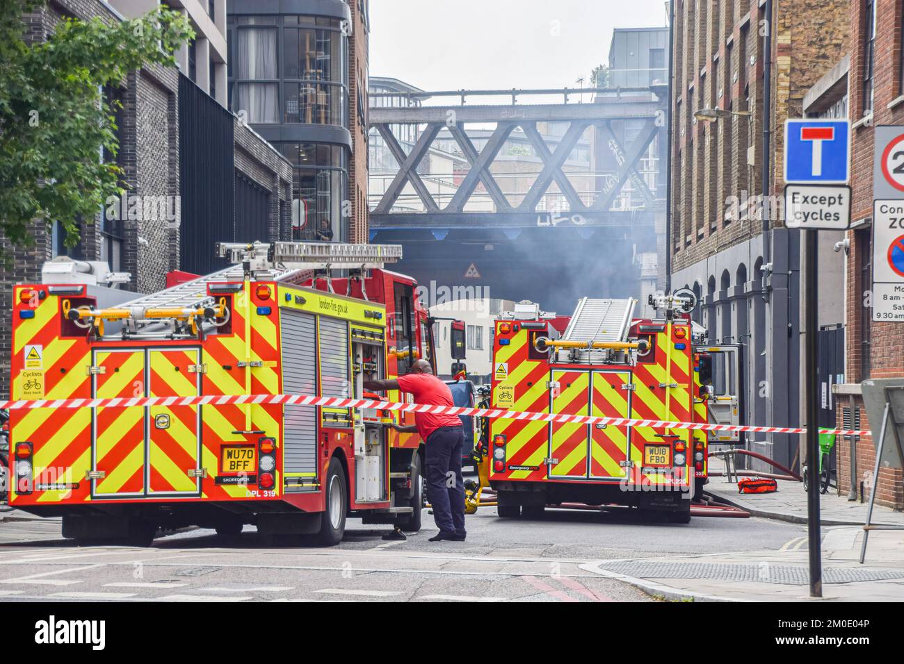 London Fire Brigade firefighters on the scene of a blaze which broke ...