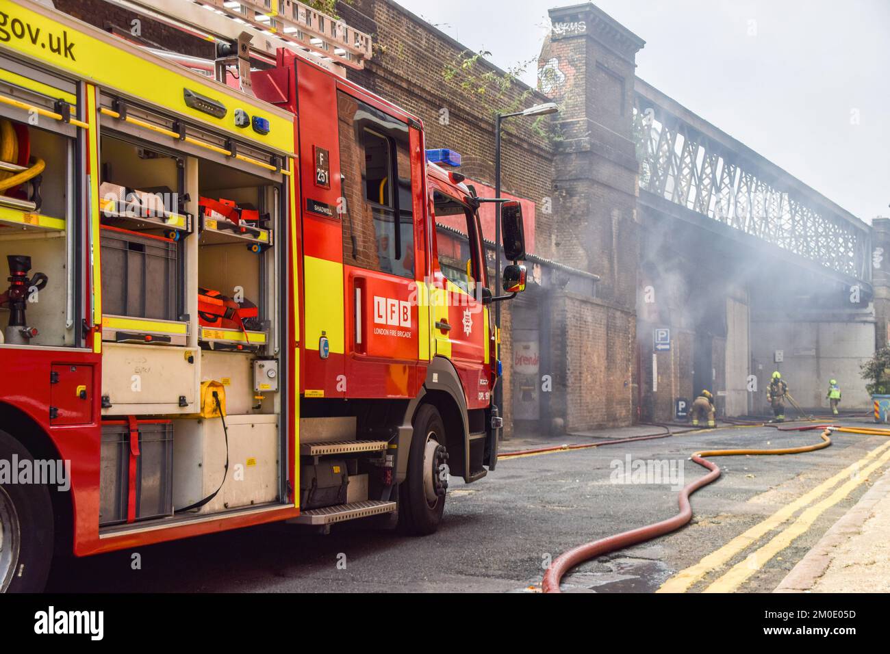 London Fire Brigade firefighters on the scene of a blaze which broke ...