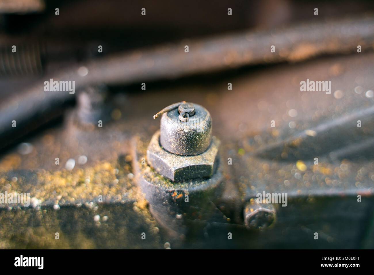 Oil pressure sensor on the body of the walk-behind tractor close-up ...