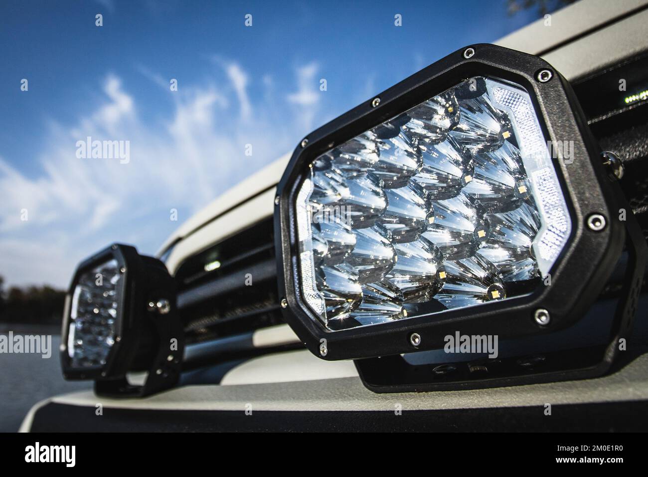 LED fog lights are mounted on the car bumper as an additional hinged ...