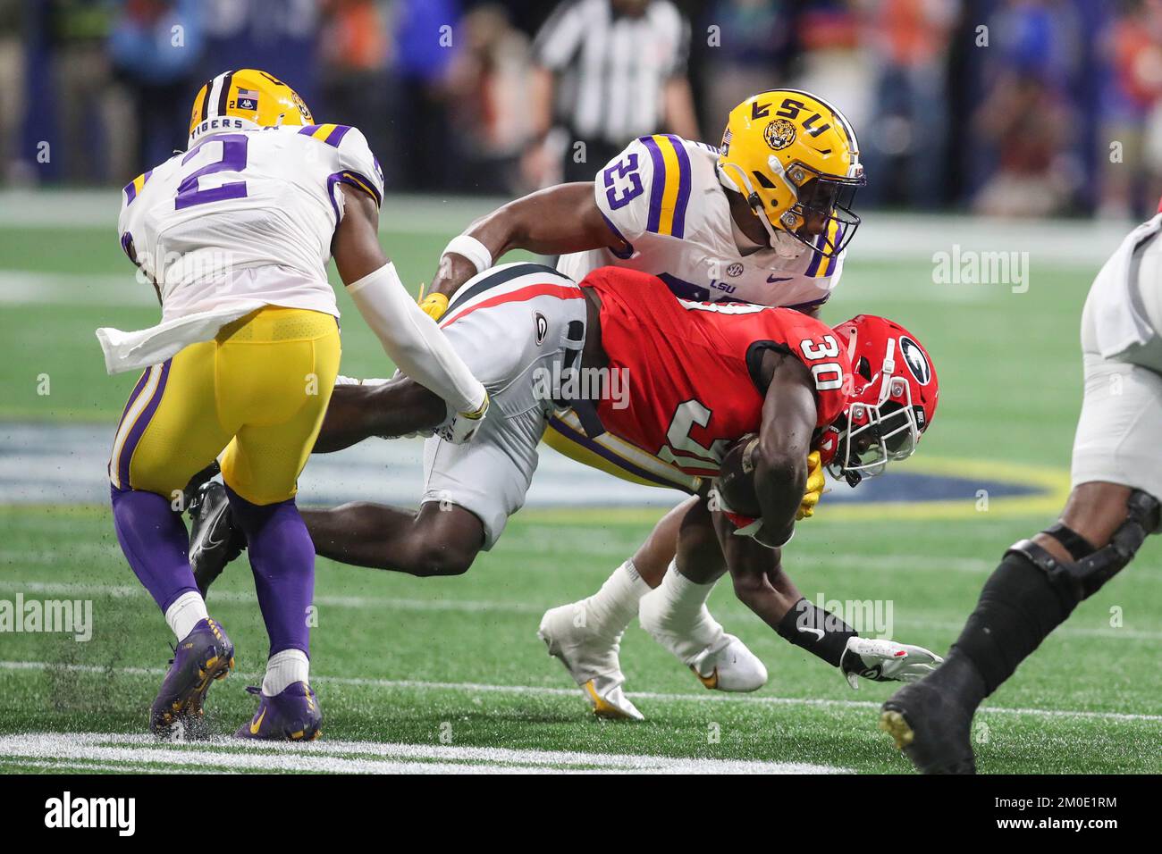 Atlanta, GA, USA. 03rd Dec, 2022. Georgia's Daijun Edwards (30) is ...