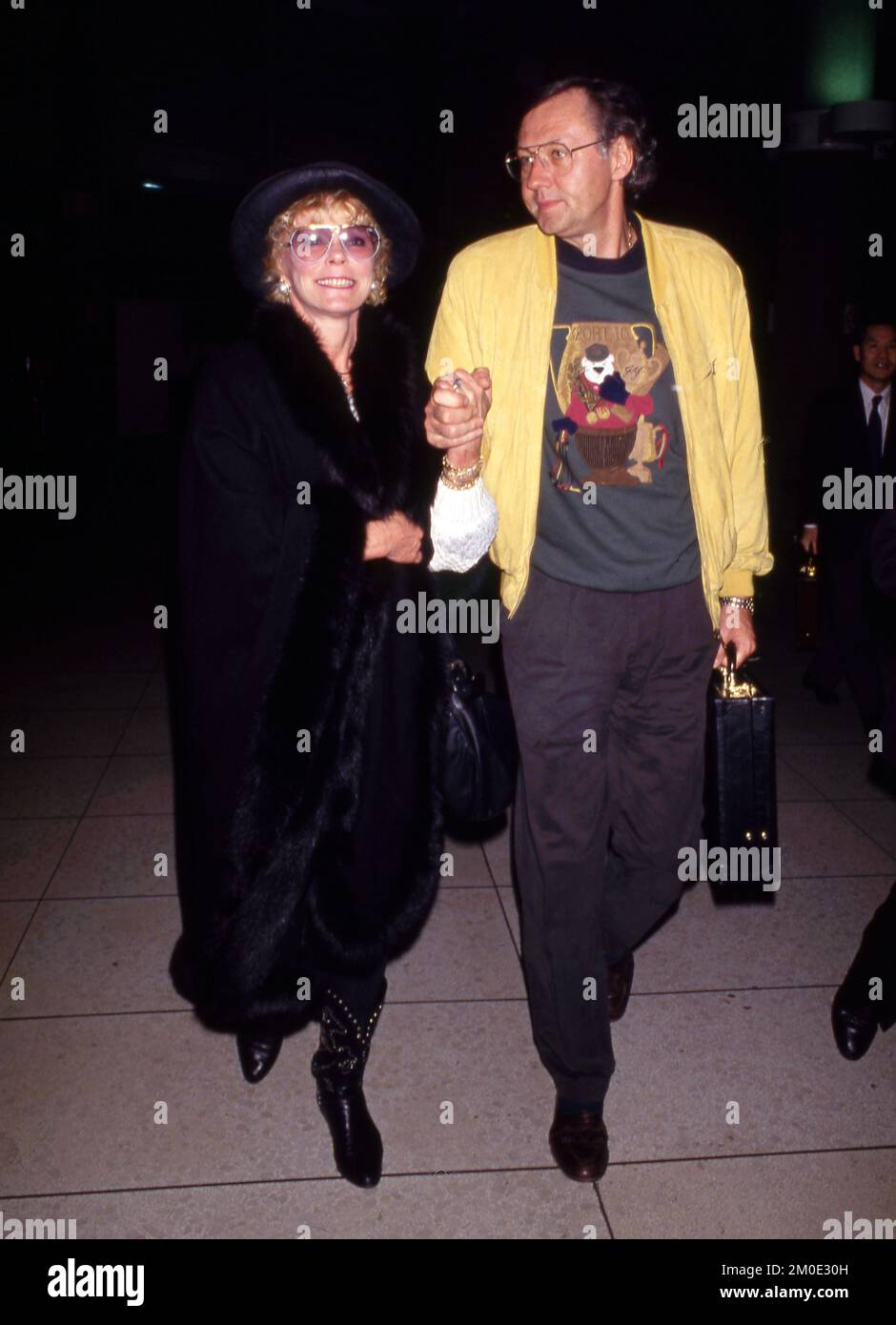 Elke Sommer and Wolf Walther seen at Los Angeles International Airport ...