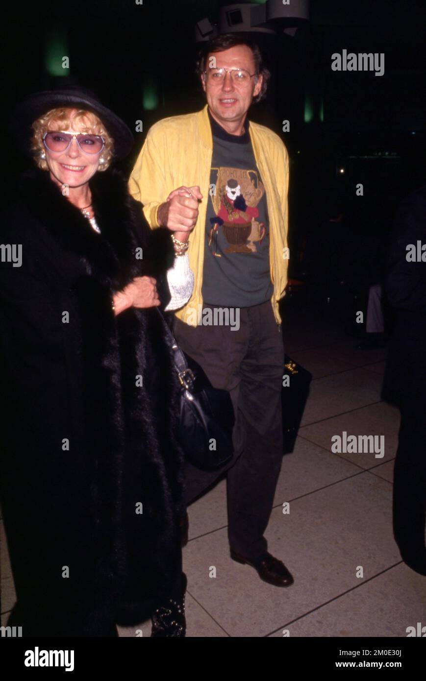 Elke Sommer and Wolf Walther seen at Los Angeles International Airport ...