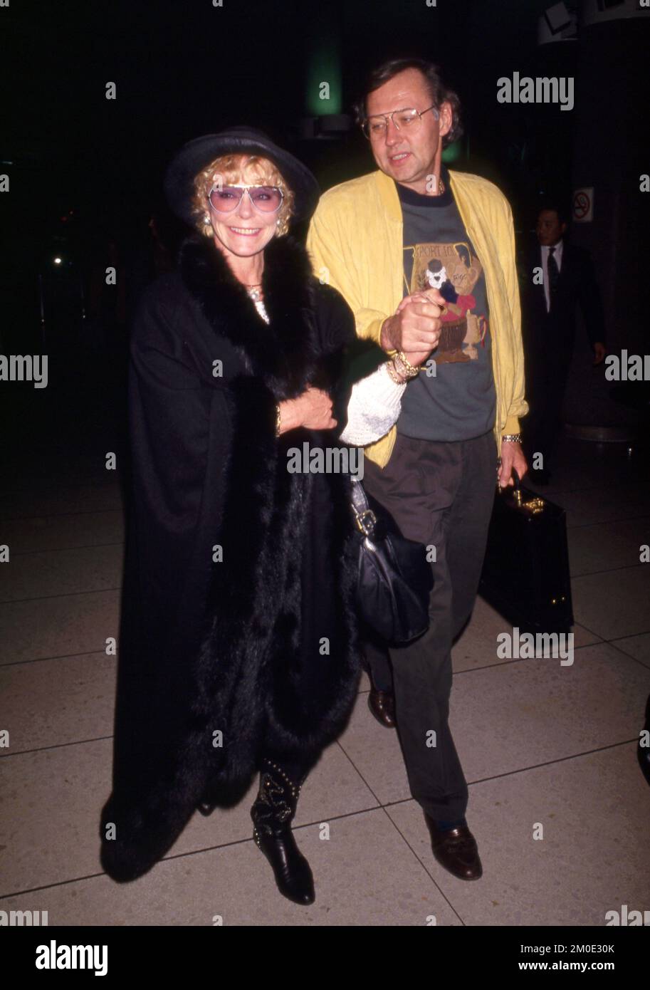 Elke Sommer and Wolf Walther seen at Los Angeles International Airport ...