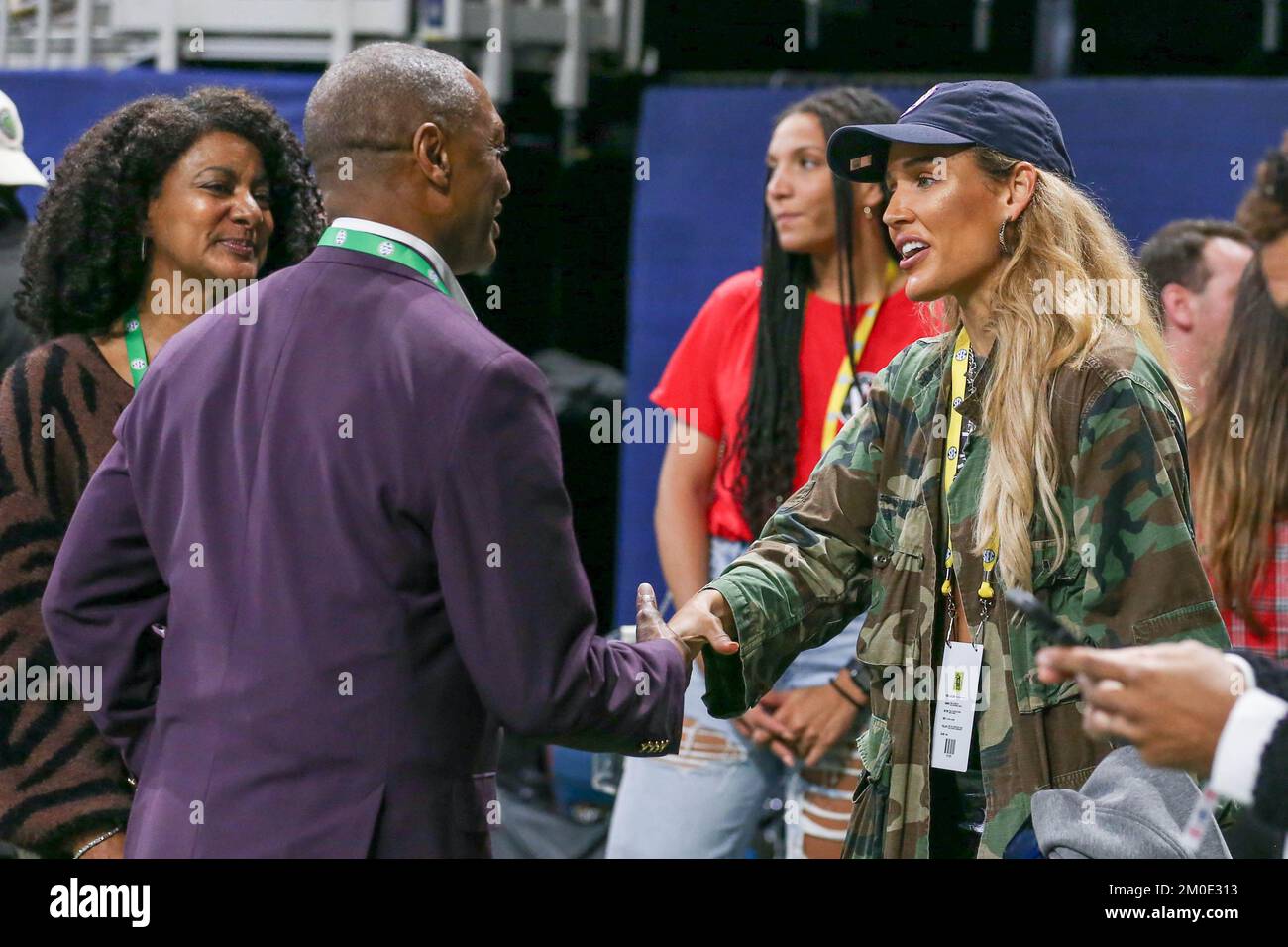 December 03, 2022: LSU great Lolo Jones shakes hands with LSU President ...