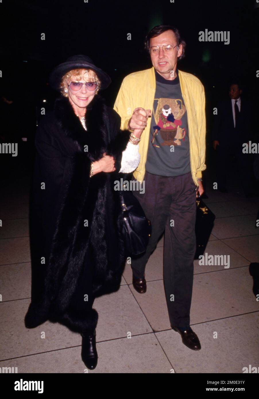 Elke Sommer and Wolf Walther seen at Los Angeles International Airport ...