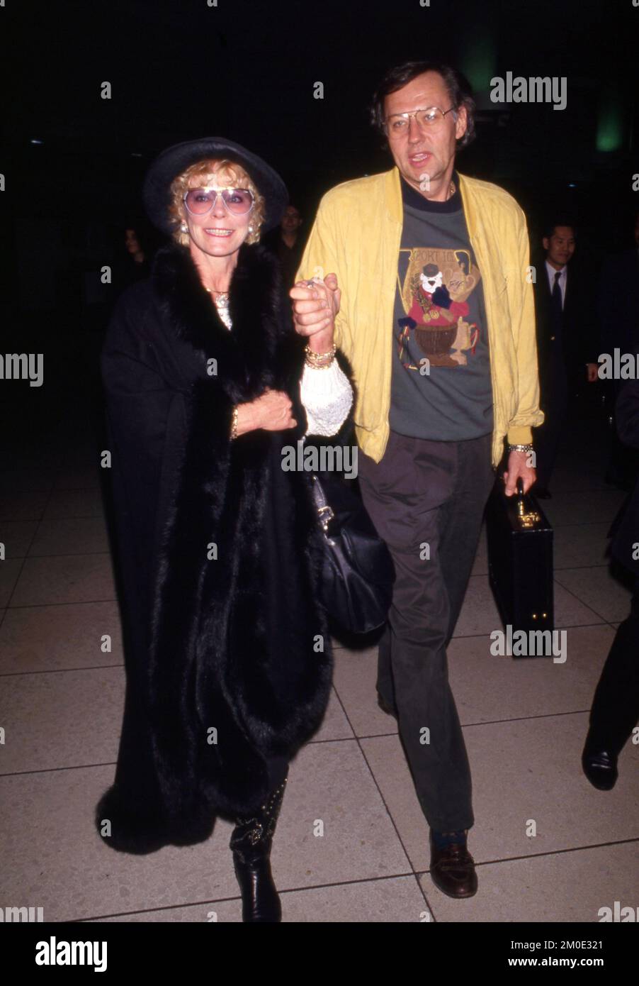 Elke Sommer and Wolf Walther seen at Los Angeles International Airport ...