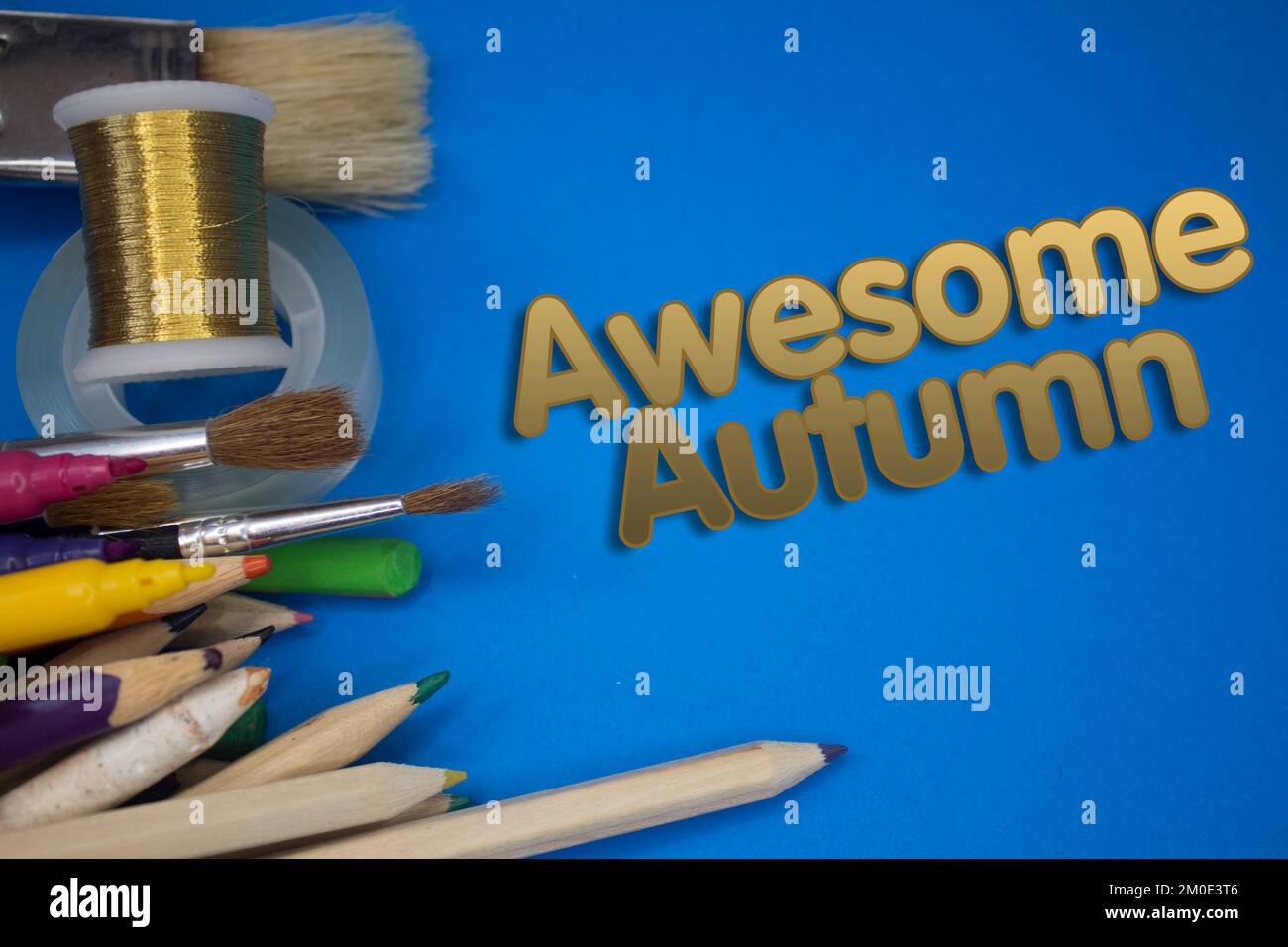 Overhead shot of school supplies with Awesome Autumn text. Brushes ...