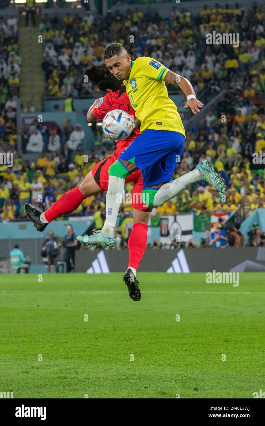 Raphinha of Brazil jumps for the ball during the FIFA World Cup Qatar ...