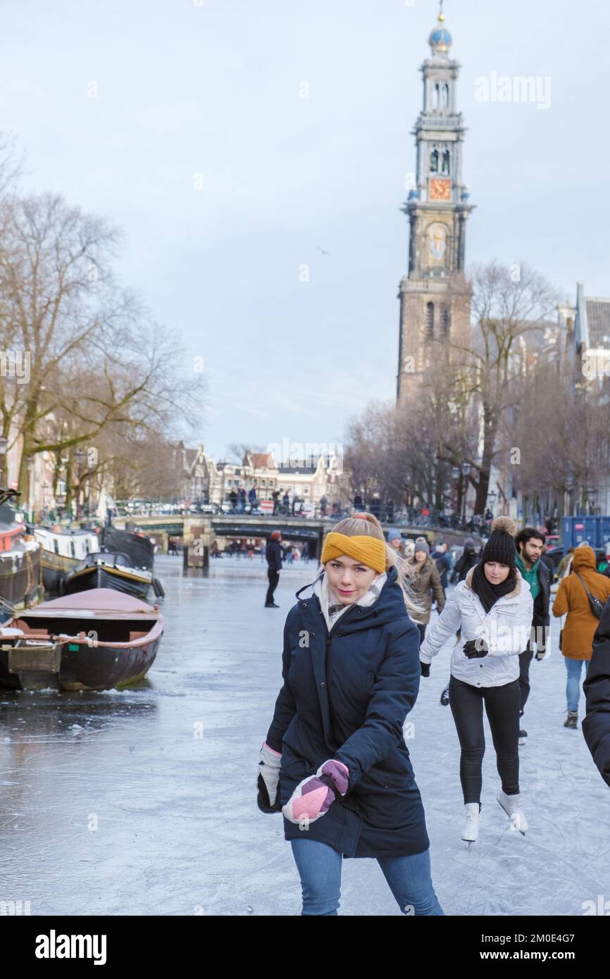 Amsterdam Netherlands February 2021, a cold winter day with people ice ...