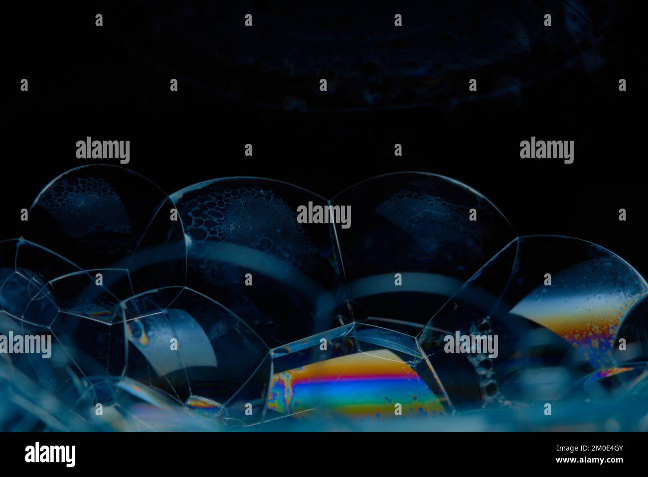 Cascading rainbow colors of soap bubbles Stock Photo - Alamy