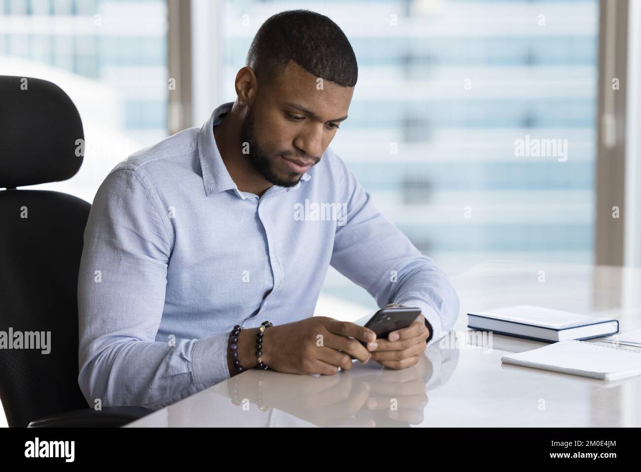 African man technology typing hi-res stock photography and images - Alamy
