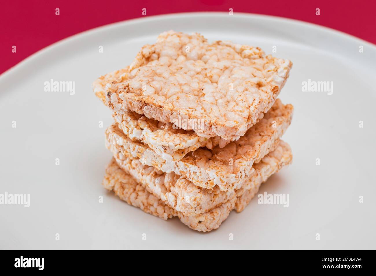 A Stack of Square Rice Cakes on White Plate. Dietary Crispbread Stock ...